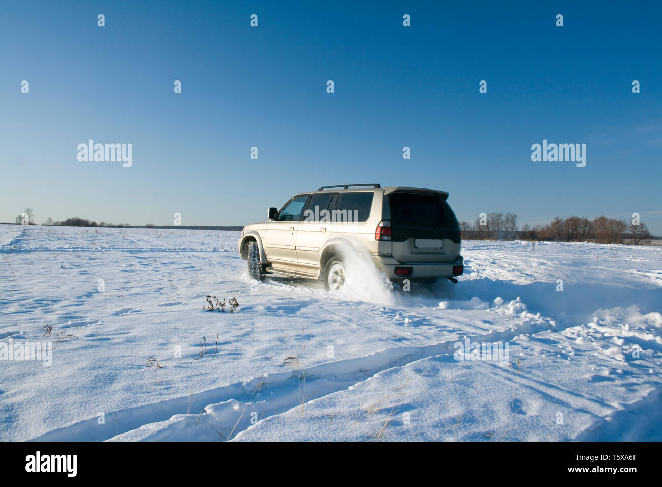 Winter off road travel. Drifting car Stock Photo - Alamy
