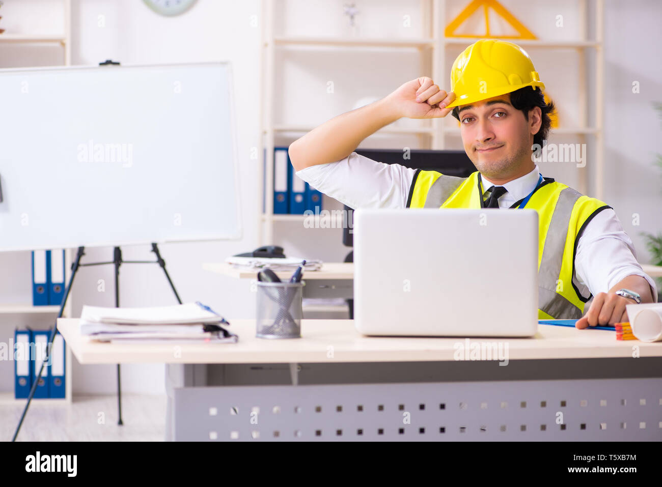 Male construction engineer working in the office Stock Photo - Alamy