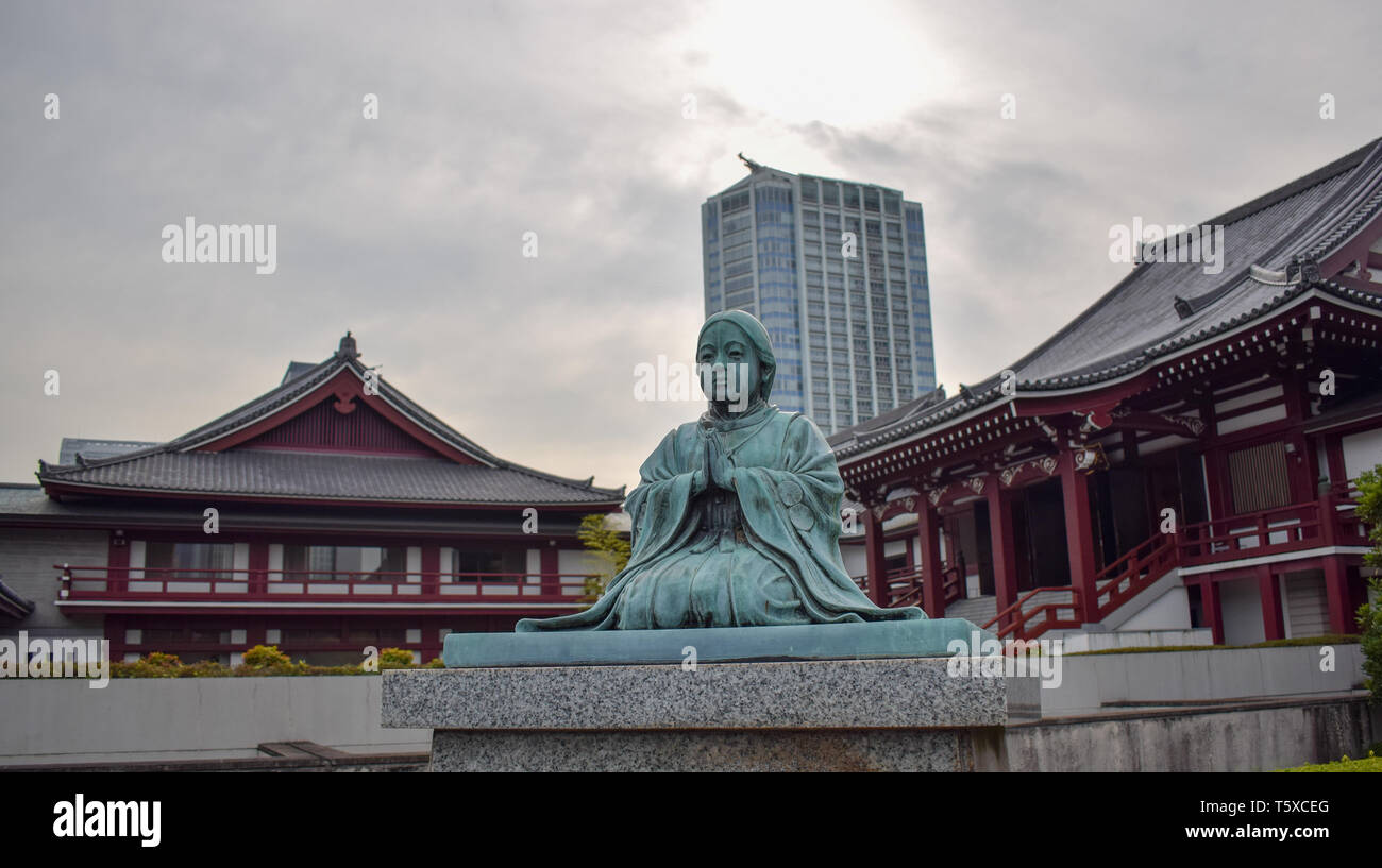 Wide shot of the statue of Princess Kazunomiya kneeling in front of ...