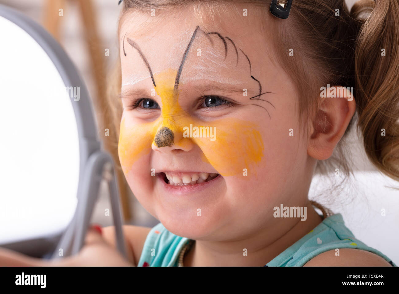 Close-up Of Smiling Pretty Girl With Painted Face Stock Photo - Alamy