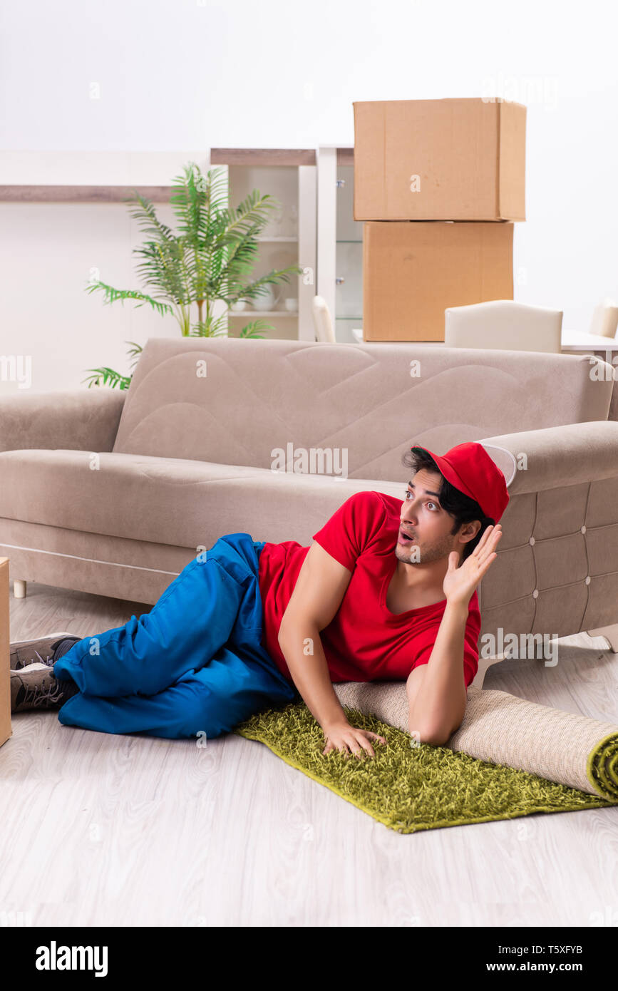 Young male contractor boxes hi-res stock photography and images - Alamy