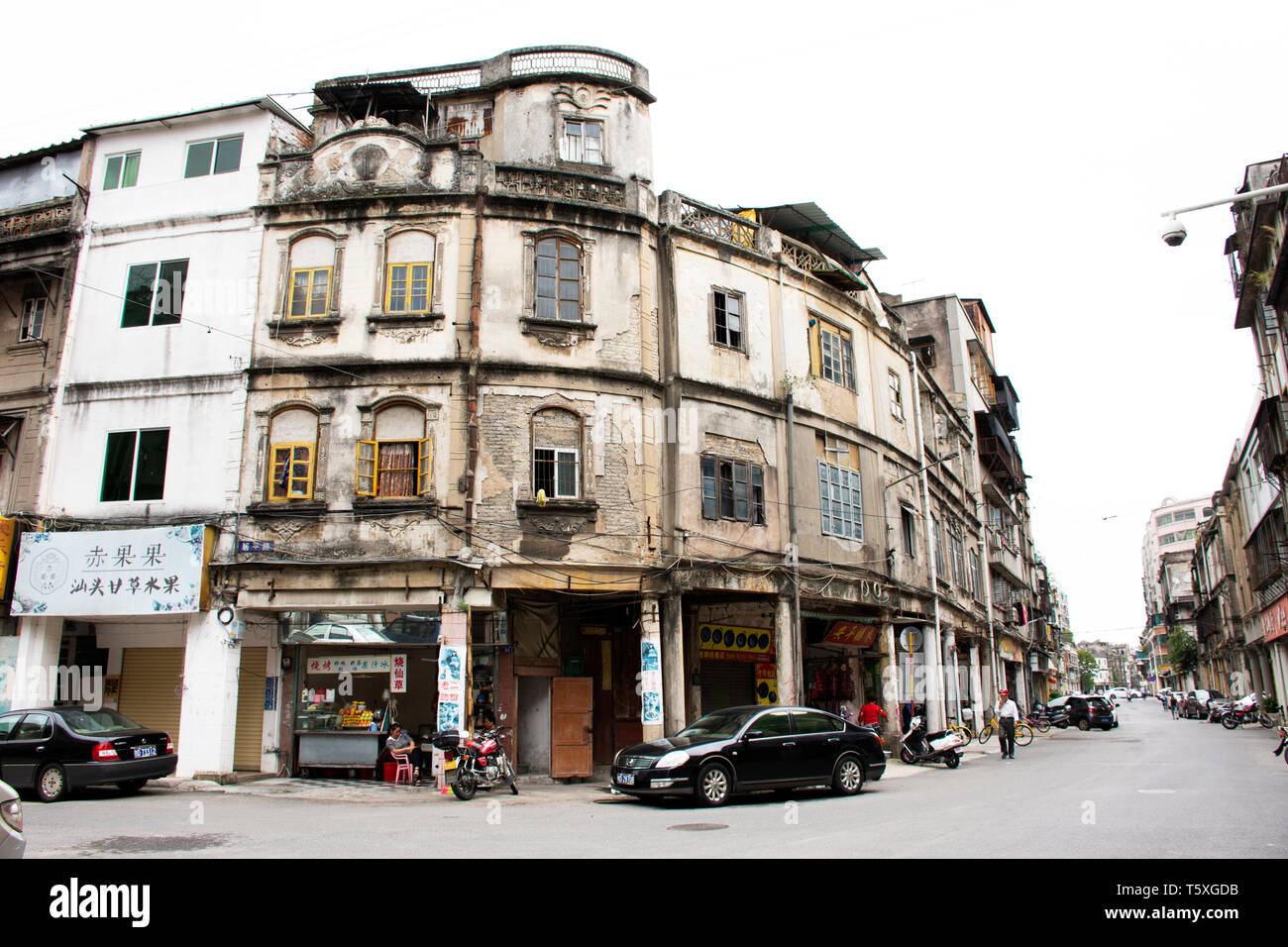 Chinese people drive and ride and bike on the road and foreigner ...