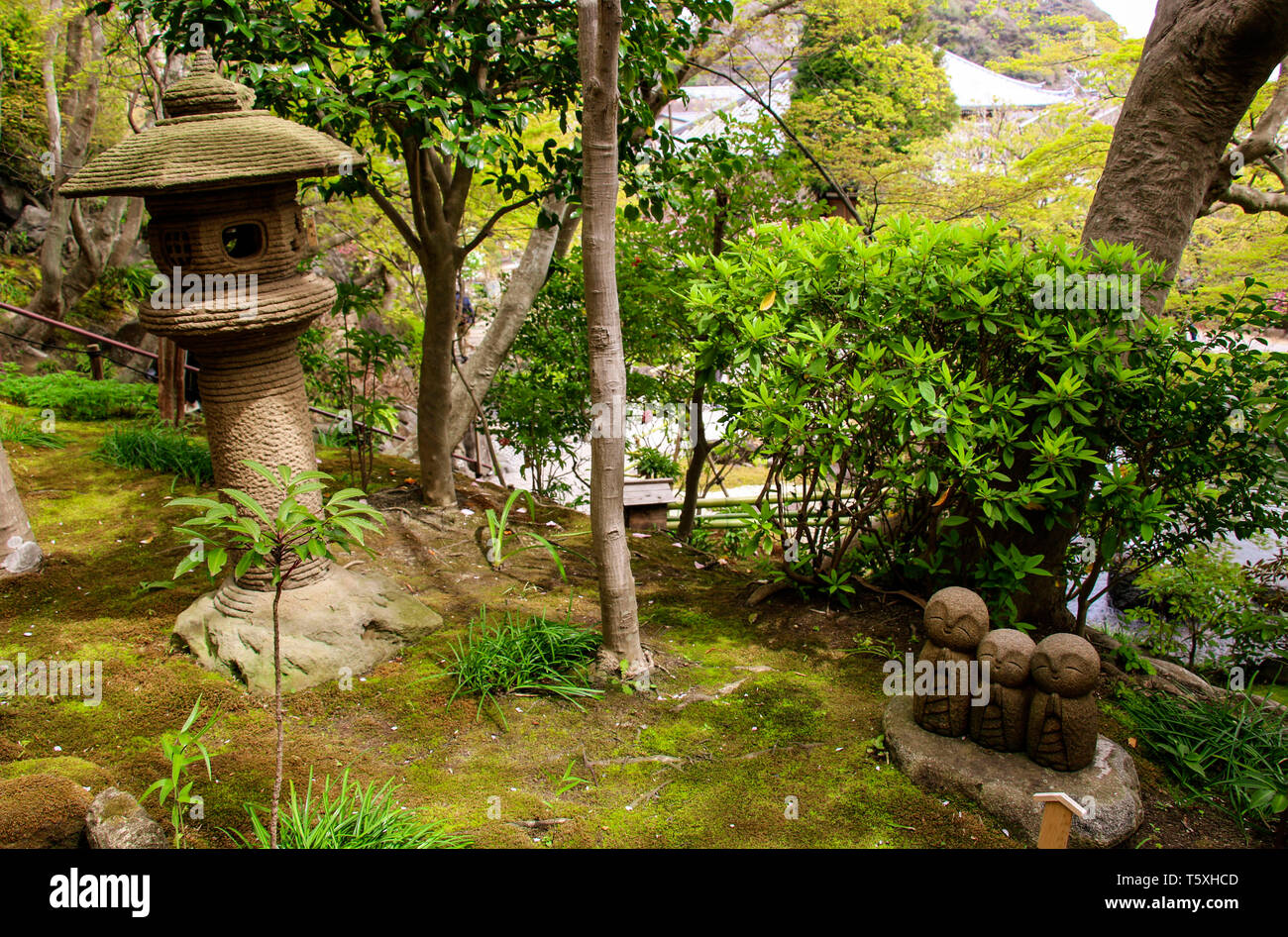 Stone statue of three smiling Jizo (Nagomi Jizo), Hasedera temple ...