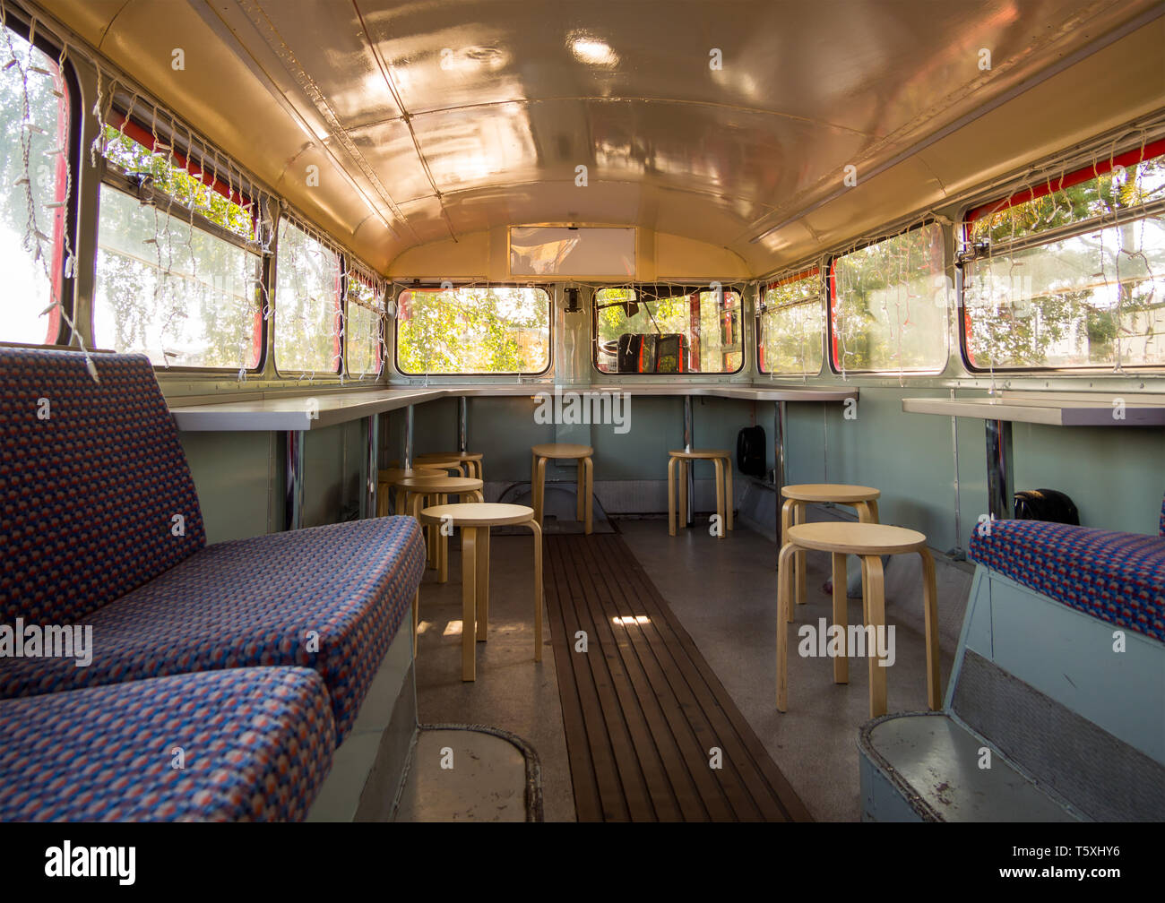 Alteration of the cabin of the old bus in a cafe with a bar Stock Photo ...