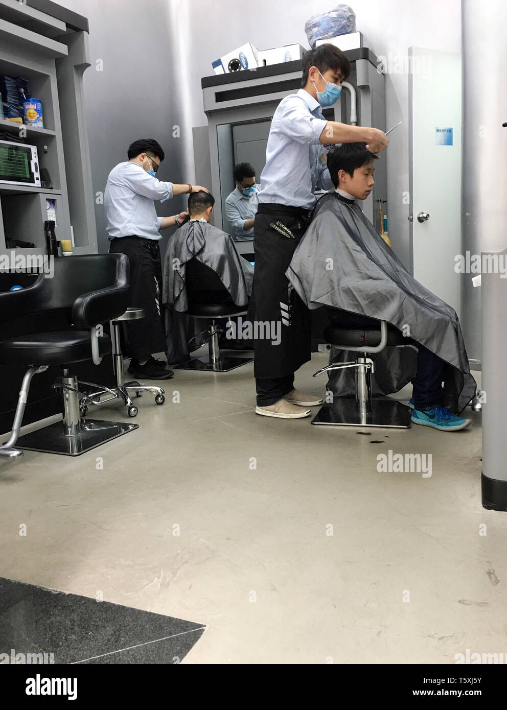 Chinese haircut hi-res stock photography and images - Alamy
