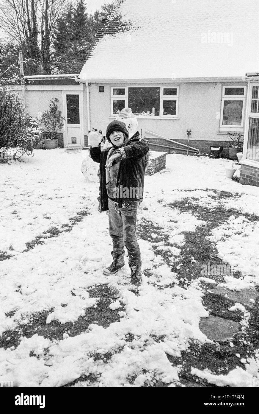 Snowball fight Black and White Stock Photos & Images - Alamy