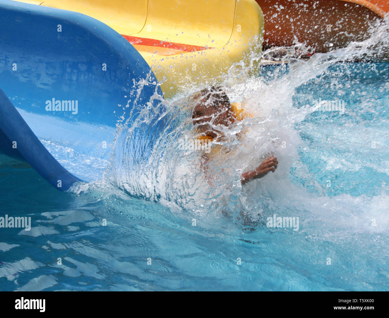 Boy falling in water pool Stock Photo - Alamy