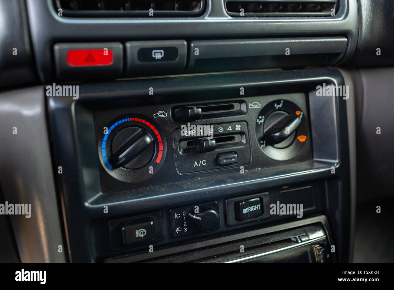 Old Japanese made sports car interior center dashboard with climate ...