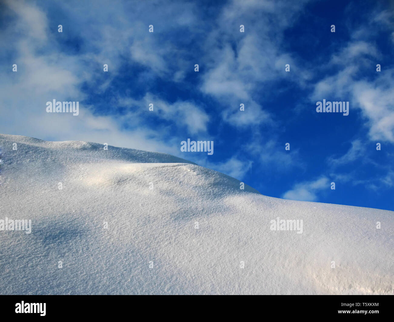 Snow cliff in mountains. Travel Stock Photo - Alamy