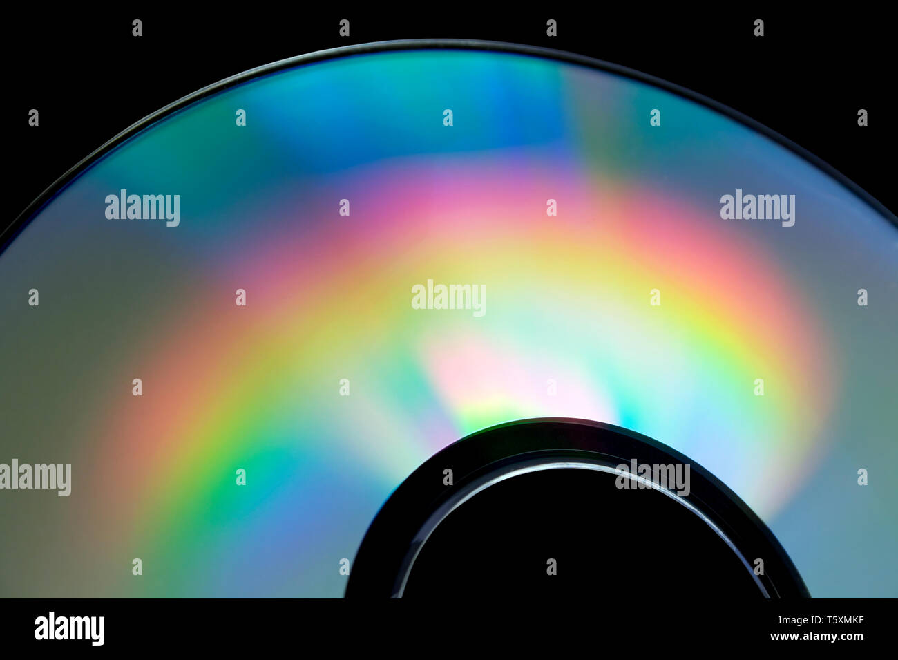 Rainbow on a compact disk . Isolated on black Stock Photo - Alamy