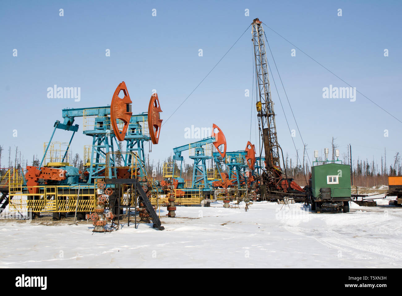 Oil extraction. Oil industry. Construction and mechanism in work Stock ...