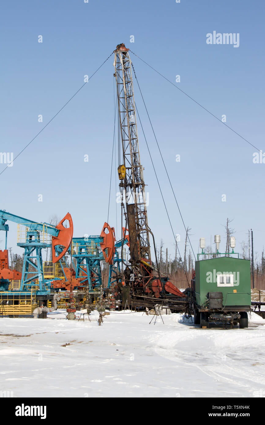 Oil extraction. Oil industry. Construction and mechanism in work Stock ...