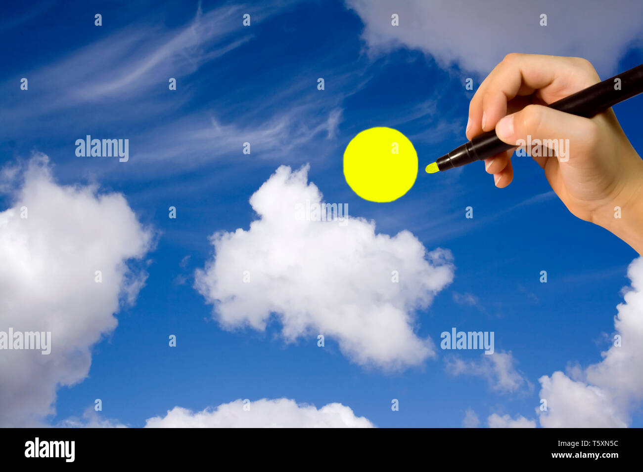 Child drawing sun on a blue sky Stock Photo - Alamy