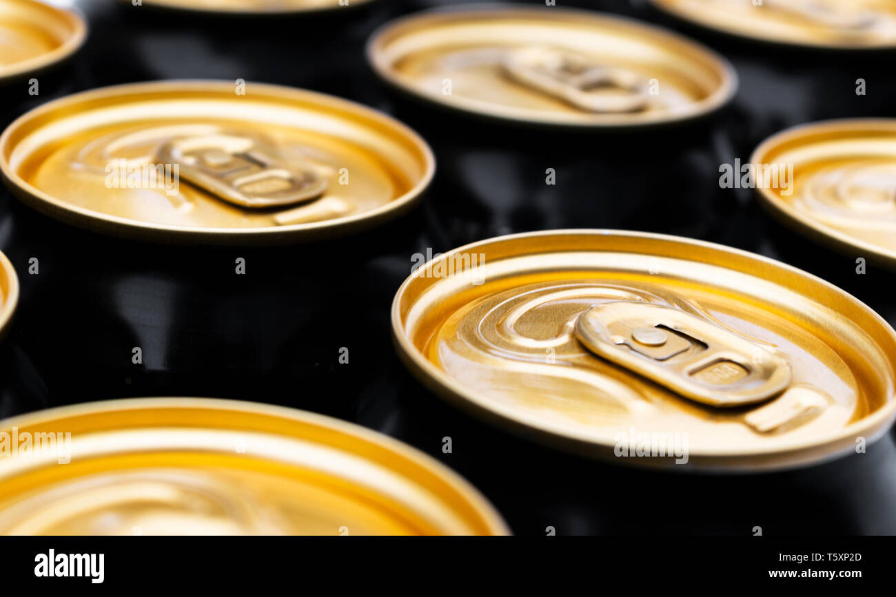 Close up photo of aluminum cans in a raw. Aluminium can background. Can ...