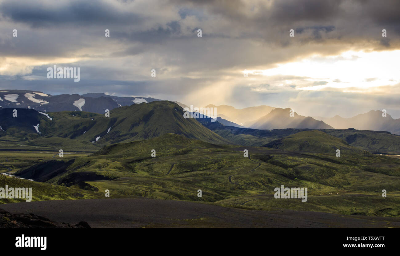 Dramatic iceland landscape with a green hill and black lava looks like ...