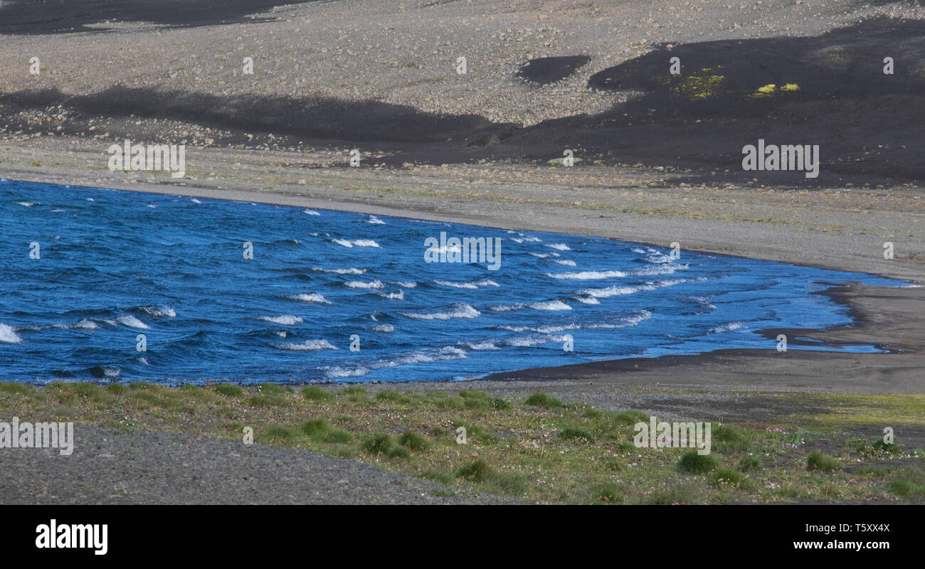 Dramatic iceland landscape with a green hill and black lava looks like ...