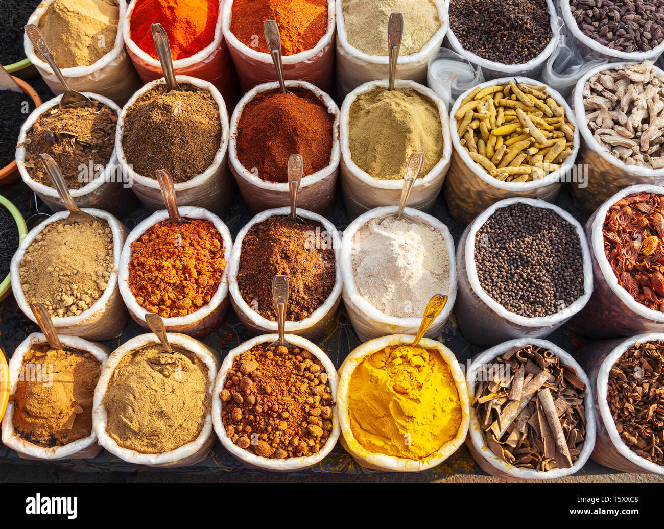 Bags with spices at the market in Goa in India Stock Photo - Alamy
