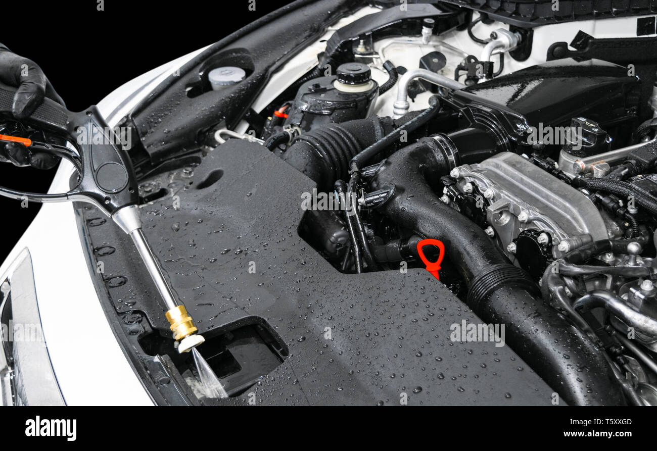 Car detailing. Manual car wash engine with pressure water. Washing car ...