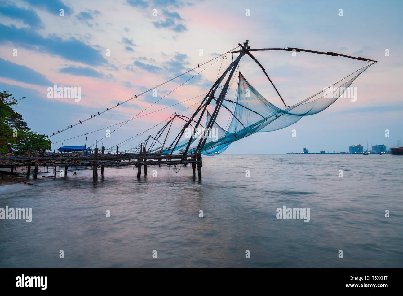 Chinese fishing nets or cheena vala are a type of stationary lift net ...
