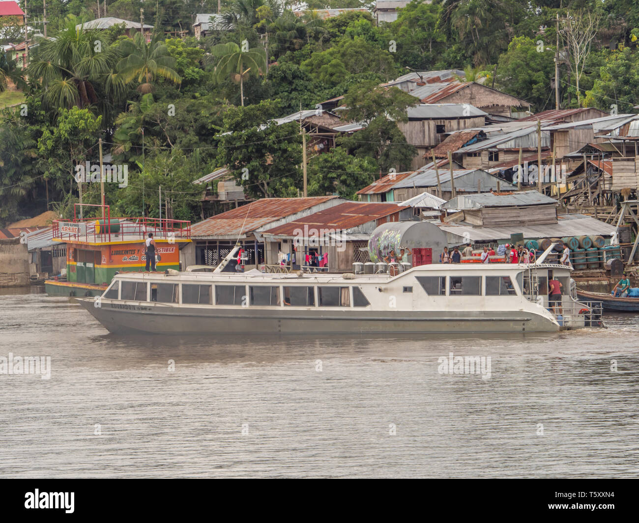 Pebas, Peru - December 04 , 2018: Speed boat come to the village on the ...