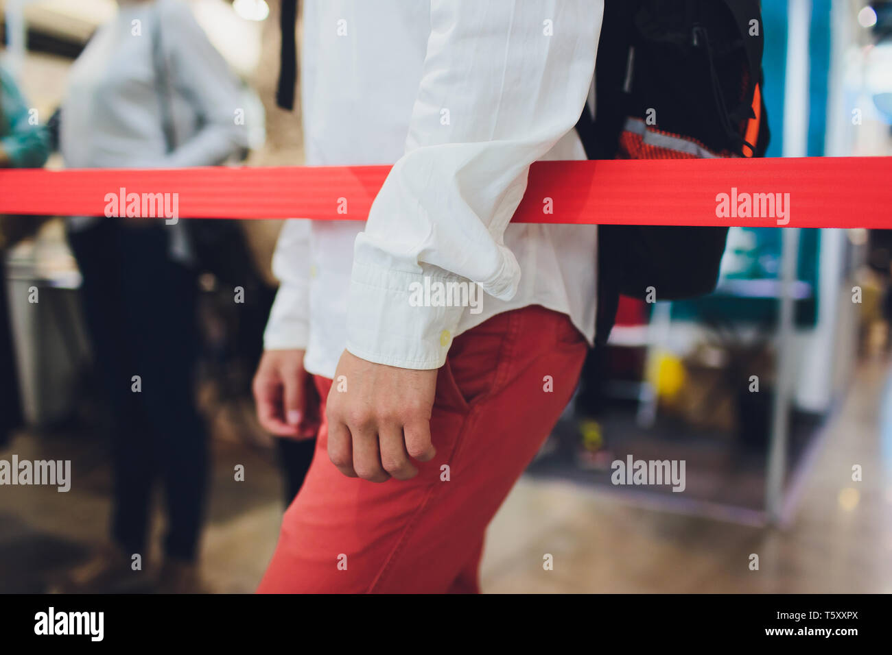 Blurred picture of Long Passenger Queue Waiting for Check-in at Airport ...