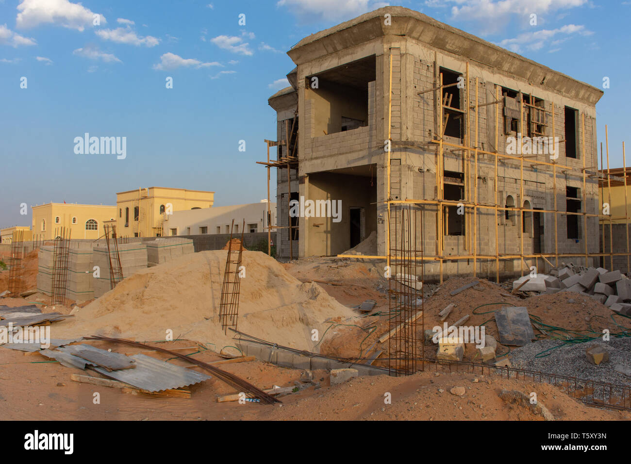Construction site in the United Arab Emirates at sunset shows new ...