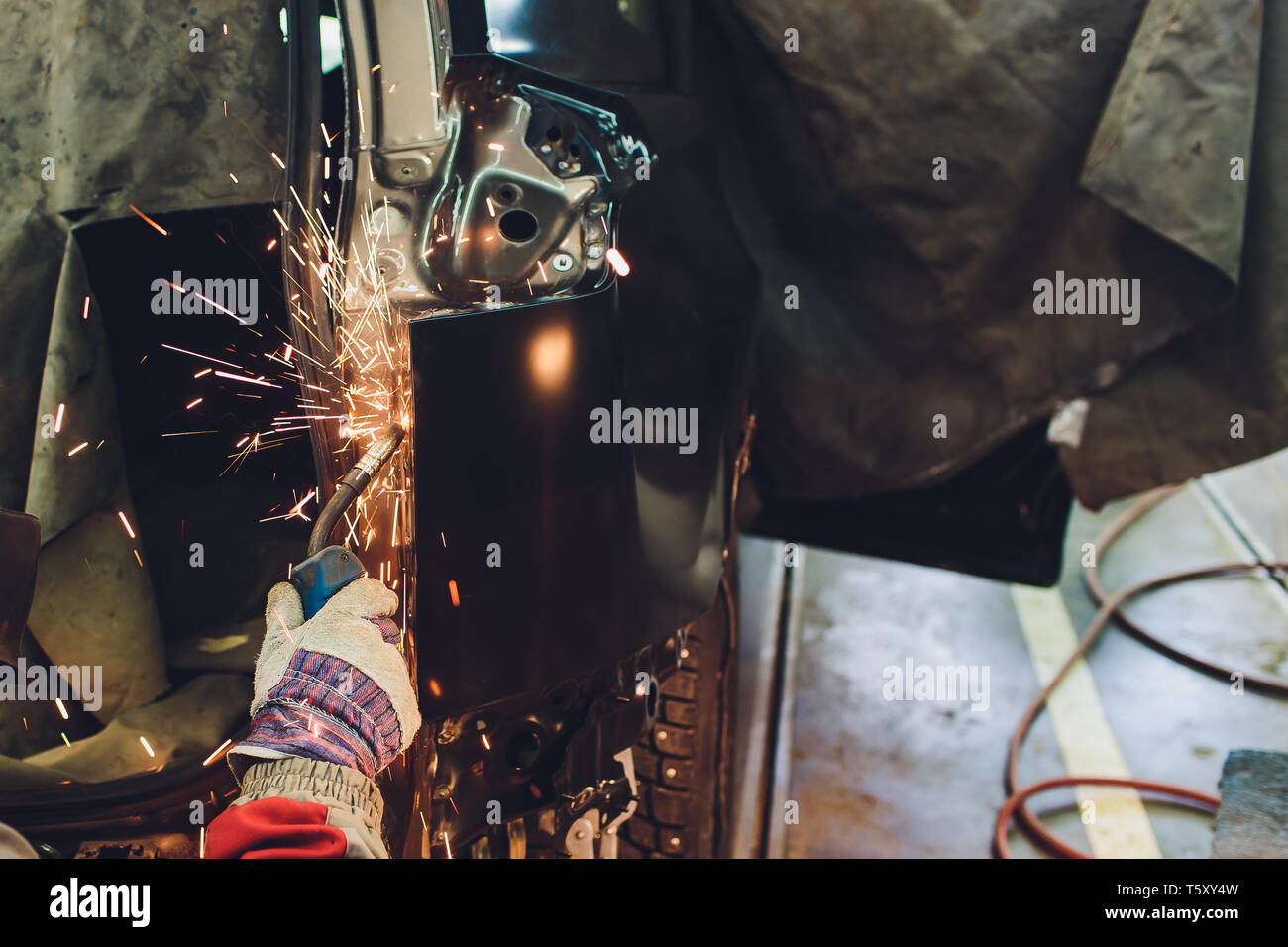Car body part in welding hi-res stock photography and images - Alamy
