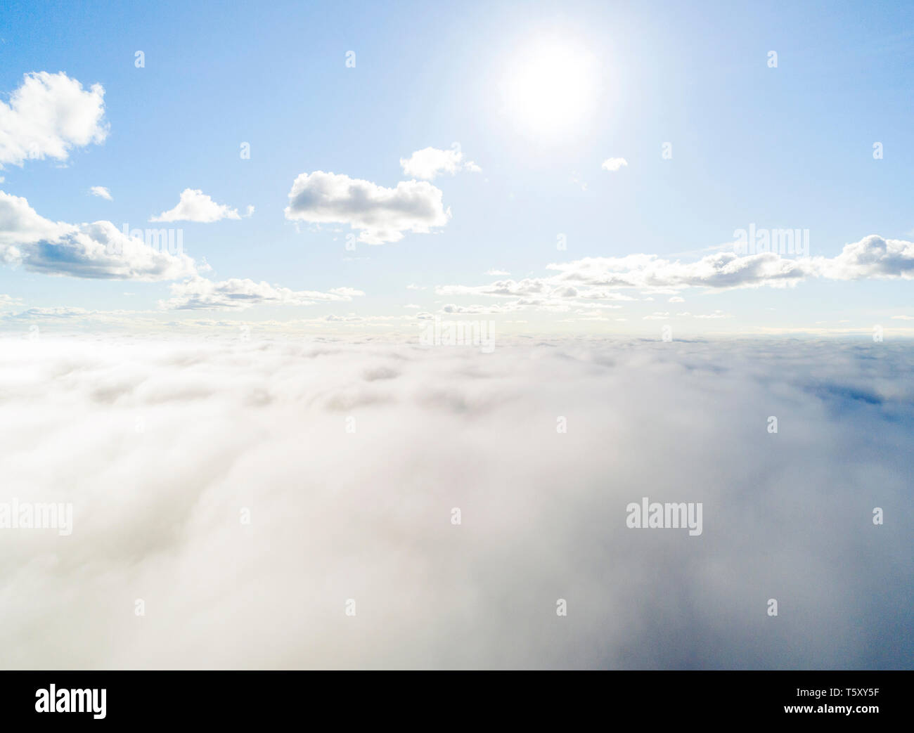 Aerial view White clouds in blue sky. Top view. View from drone. Aerial bird's eye view. Aerial ...