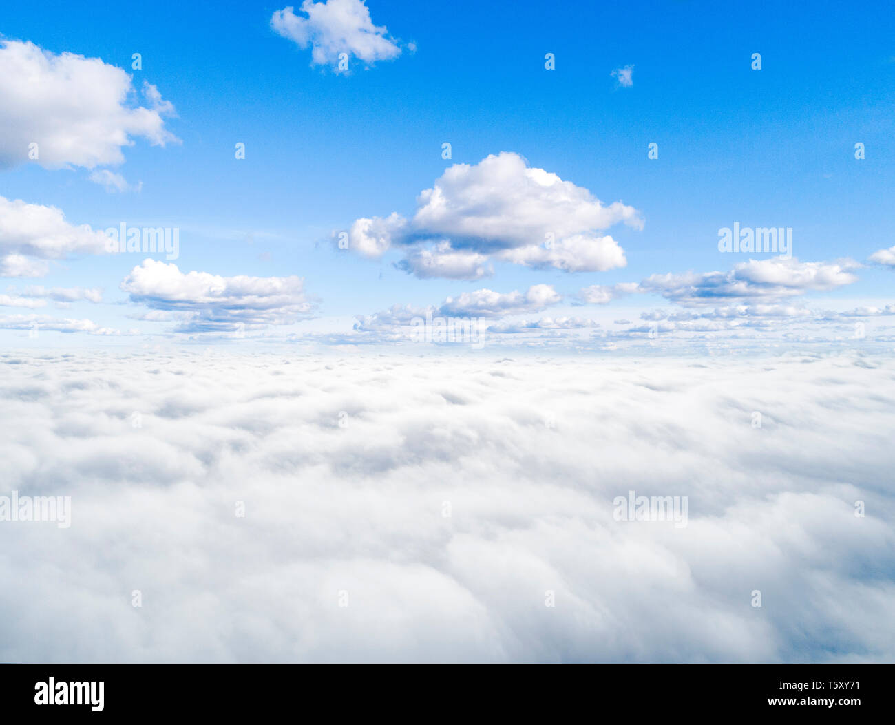 Aerial view White clouds in blue sky. Top view. View from drone. Aerial bird's eye view. Aerial ...