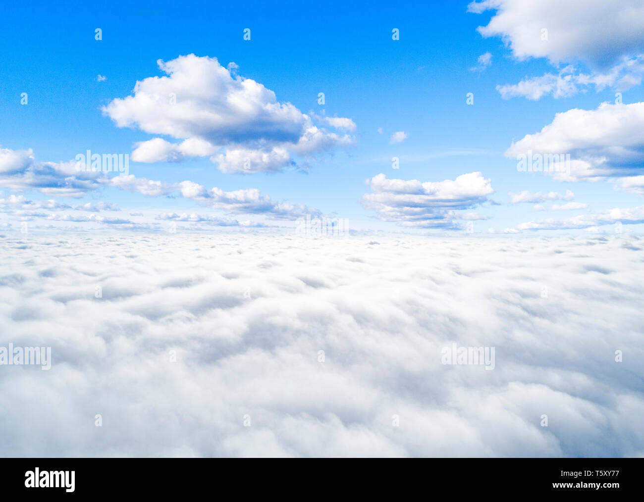 Aerial view White clouds in blue sky. Top view. View from drone. Aerial bird's eye view. Aerial ...