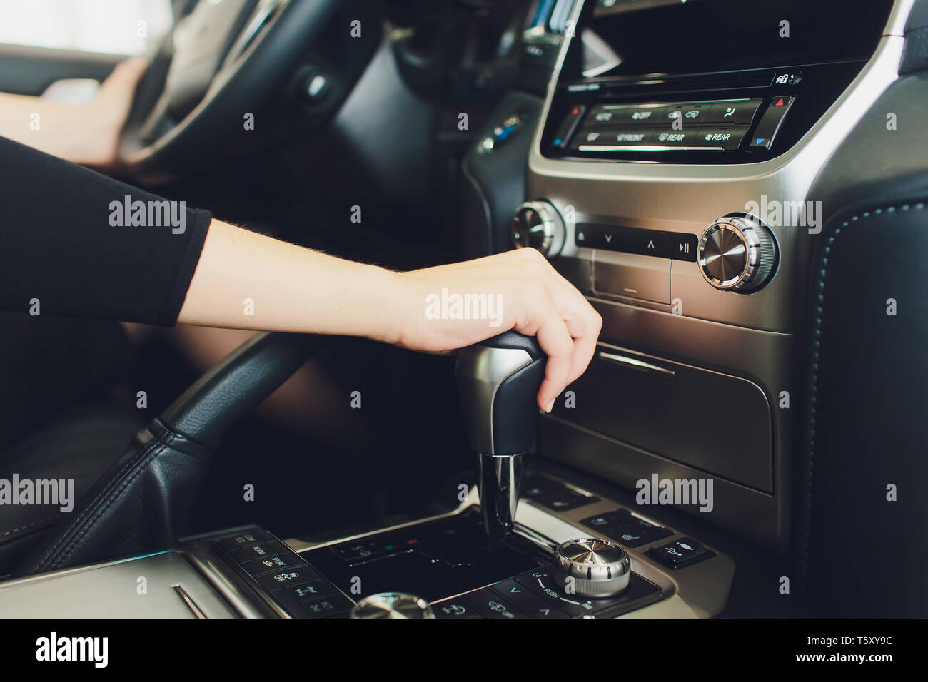 Hand on automatic gear shift hi-res stock photography and images - Alamy