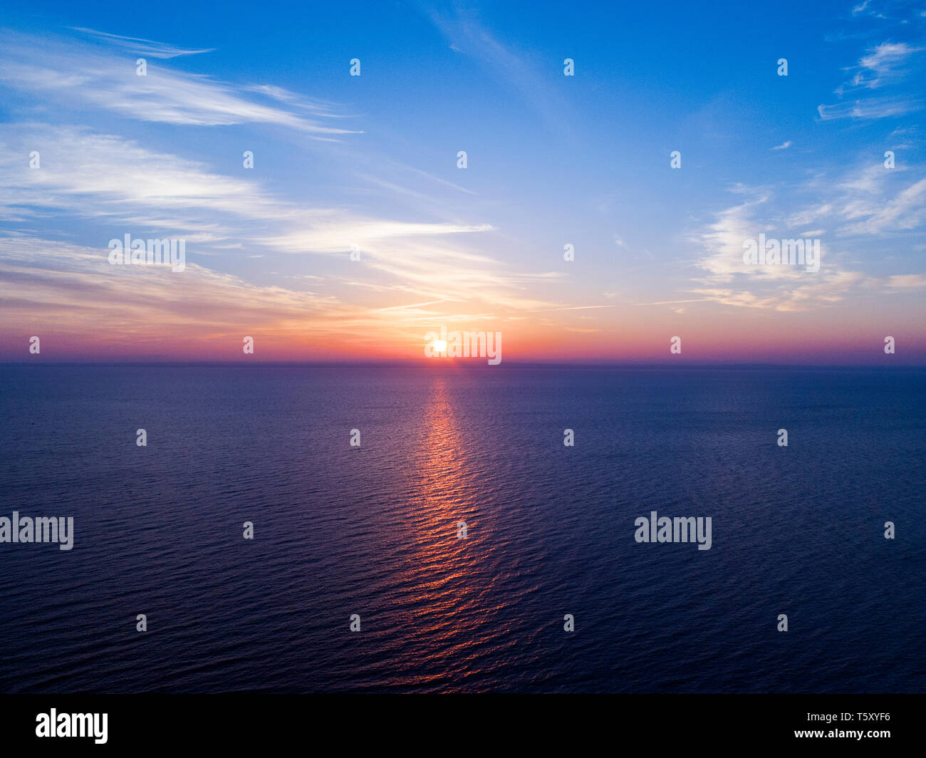 Aerial view of a Sunset sky background. Aerial Dramatic gold sunset sky ...