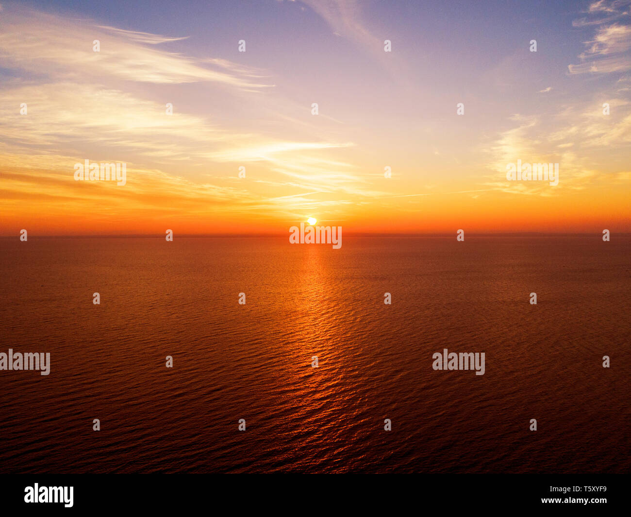 Aerial view of a Sunset sky background. Aerial Dramatic gold sunset sky ...