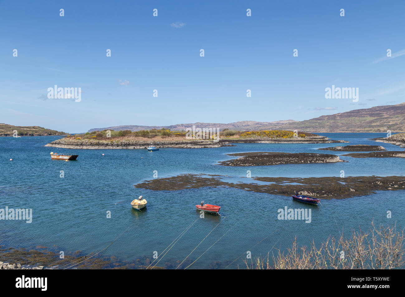 Boats near the Ulva Ferry on the Sound of Ulva between the Isle of Mull ...
