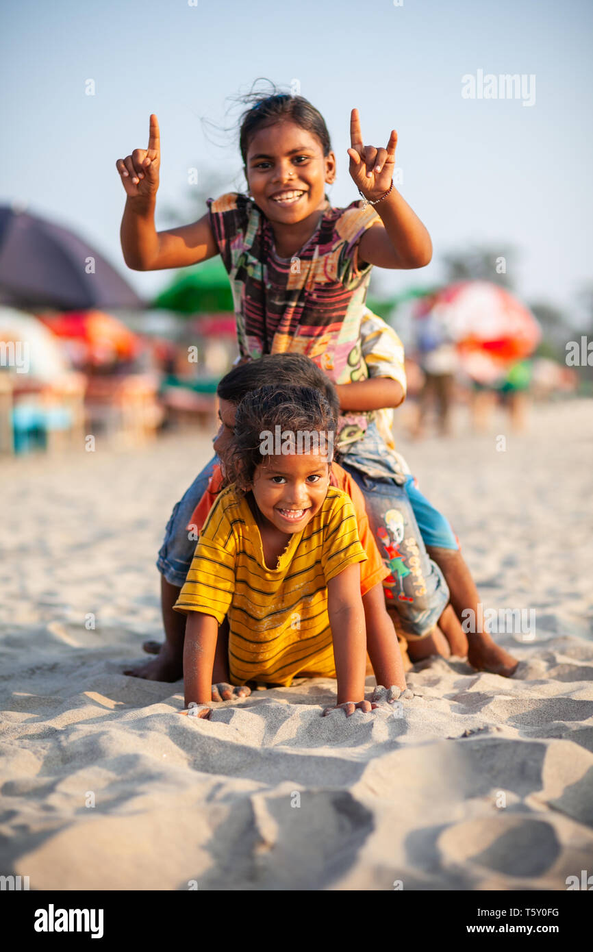 Indian family goa beach playing hi-res stock photography and images - Alamy