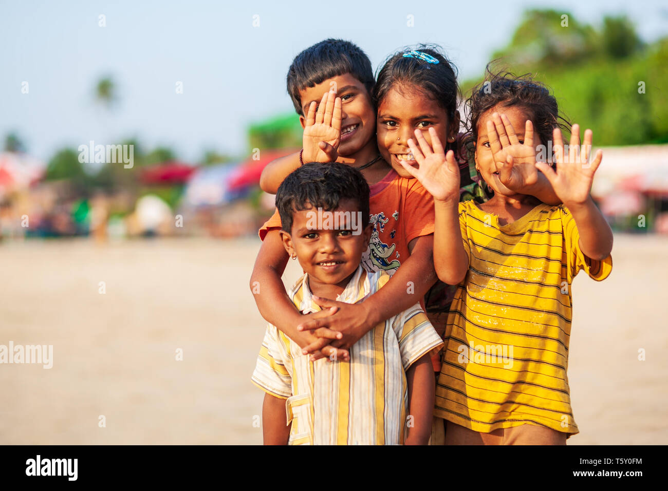 Indian family goa beach playing hi-res stock photography and images - Alamy