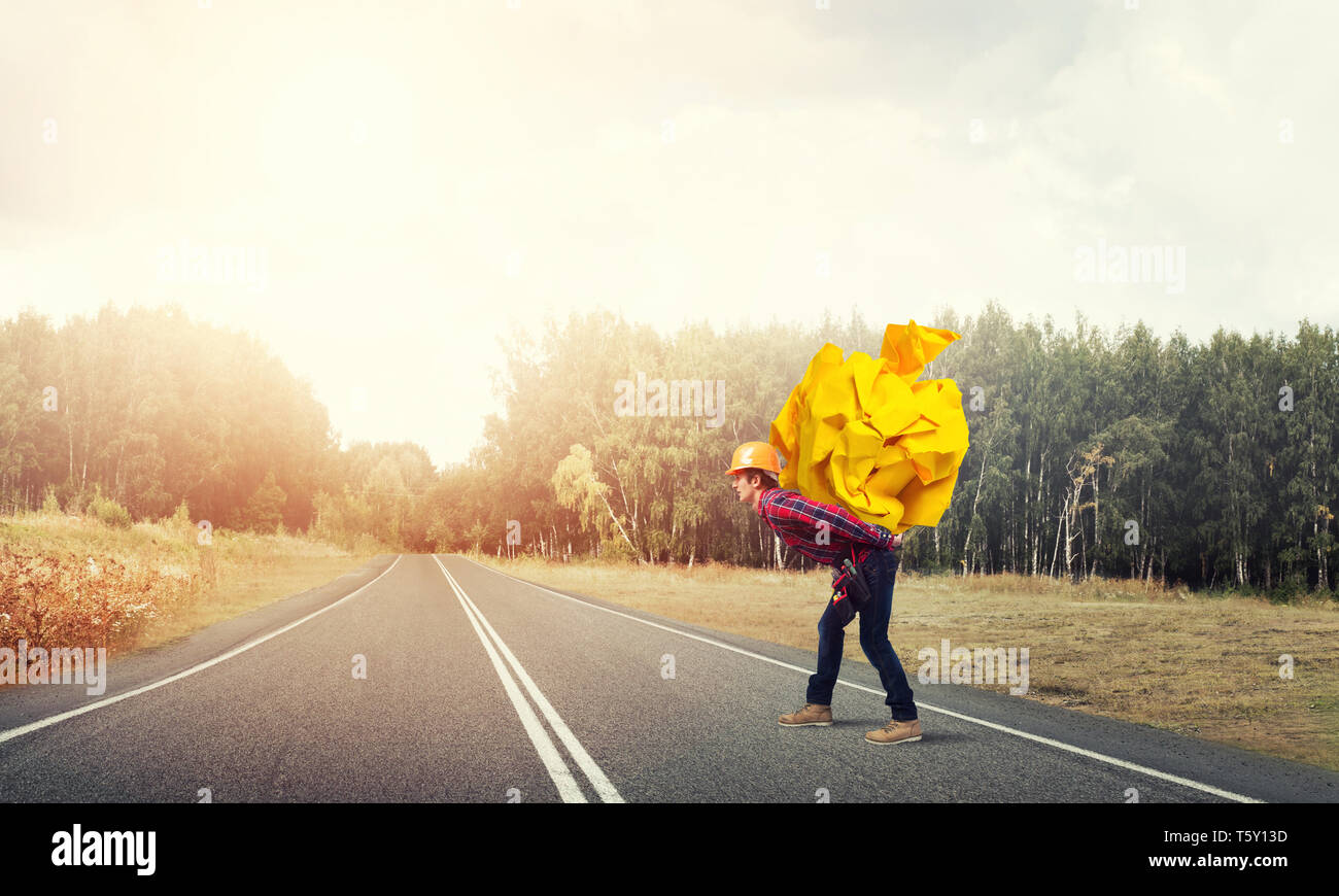 Engineer man carry load Stock Photo - Alamy