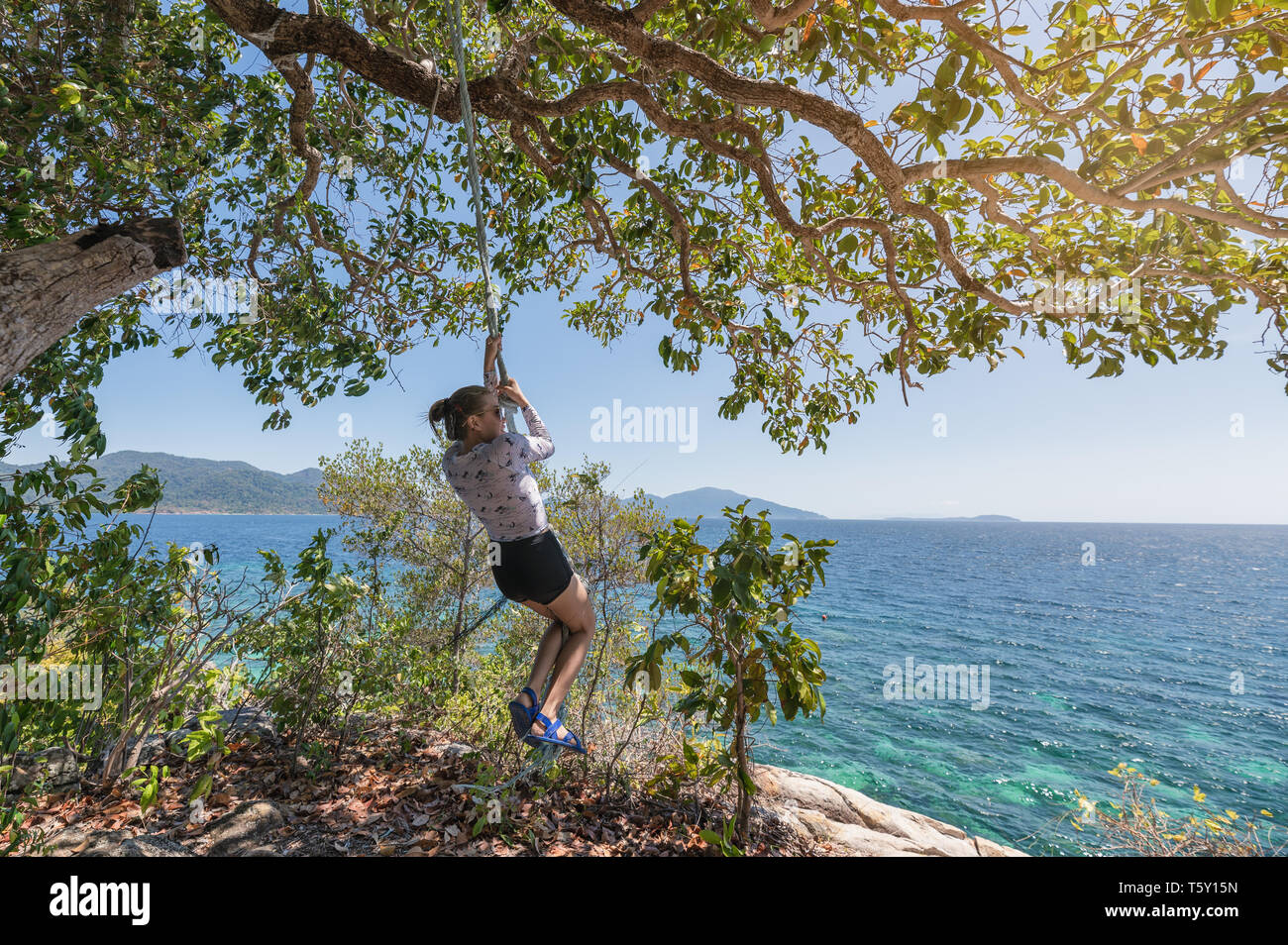Woman relax on rope hi-res stock photography and images - Alamy