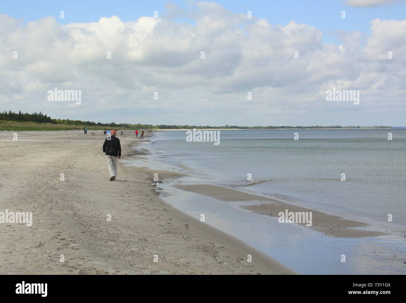 Walking on the beach at Marielyst on the island Falster. Denmark Stock ...