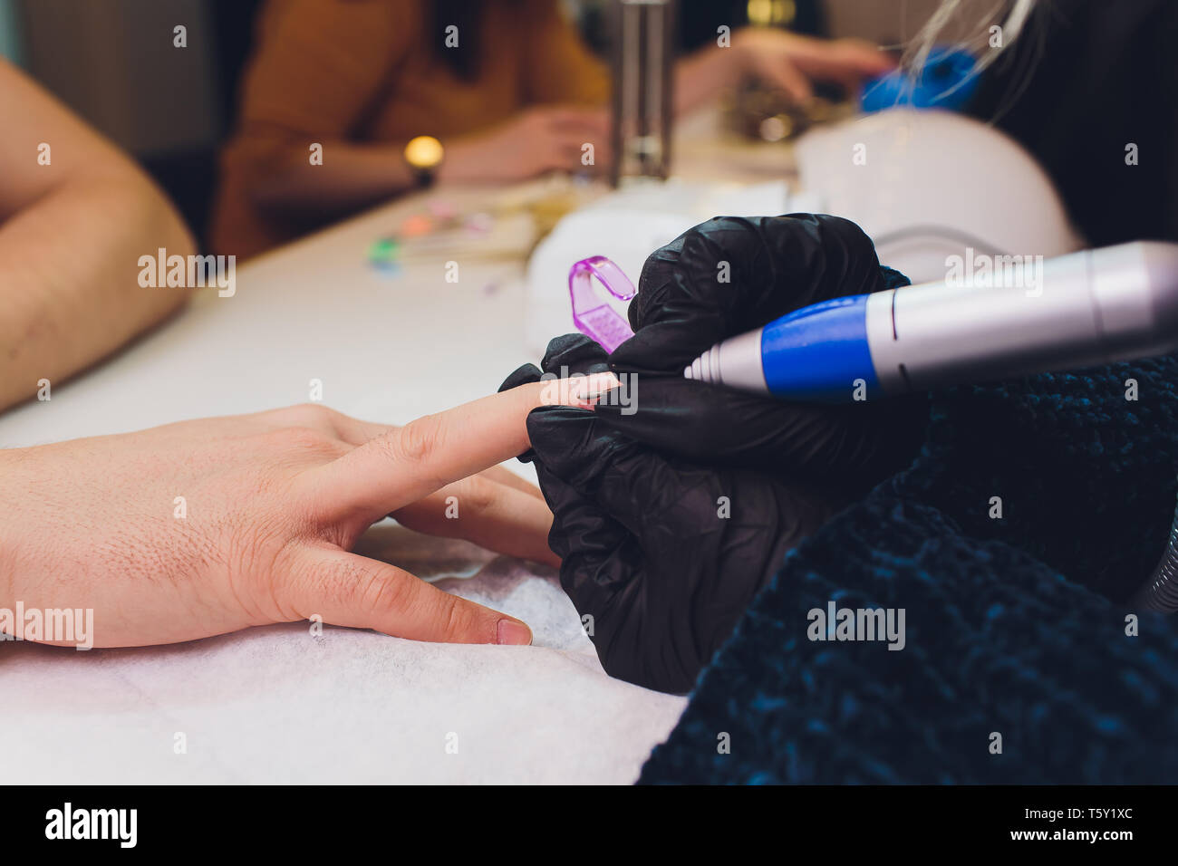 Polishing toes hi-res stock photography and images - Alamy