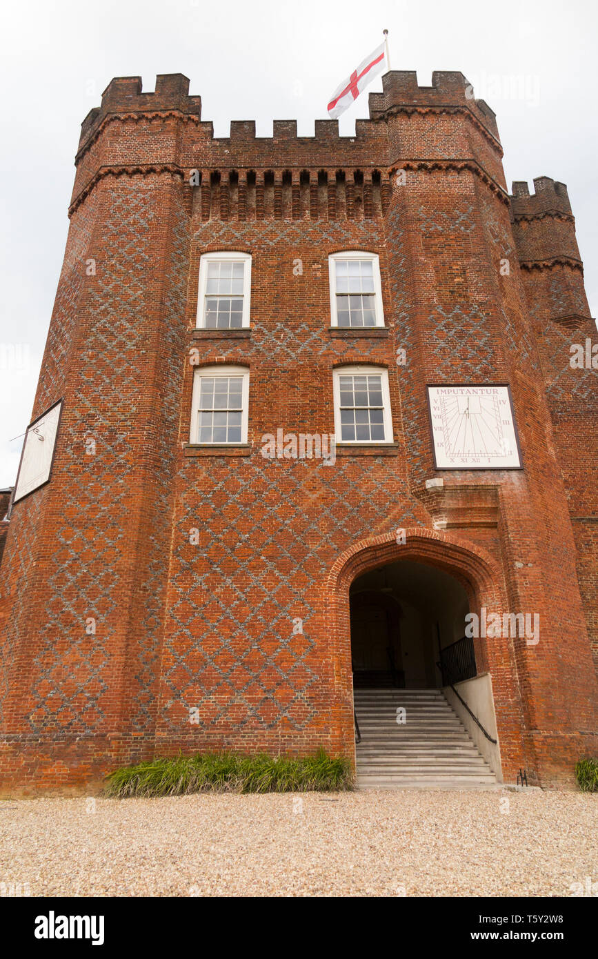 The Bishop's Palace tower of Farnham Castle, flying the flag of St ...