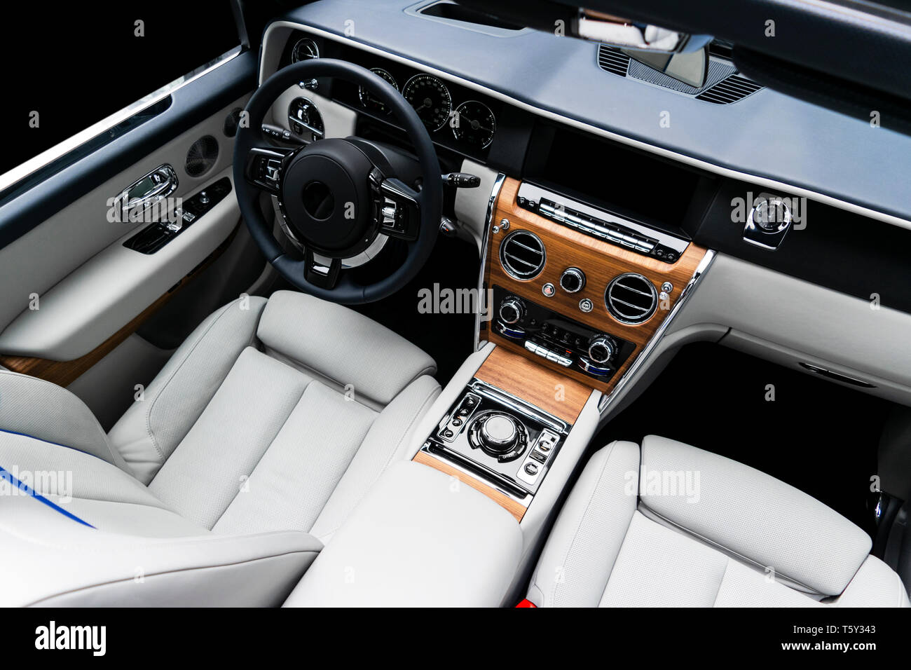 Modern luxury car white leather interior with natural wood panel. Part ...