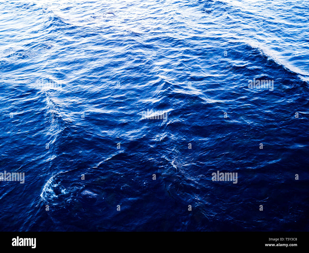 Aerial View of a Crystal clear sea water surface texture. View from ...