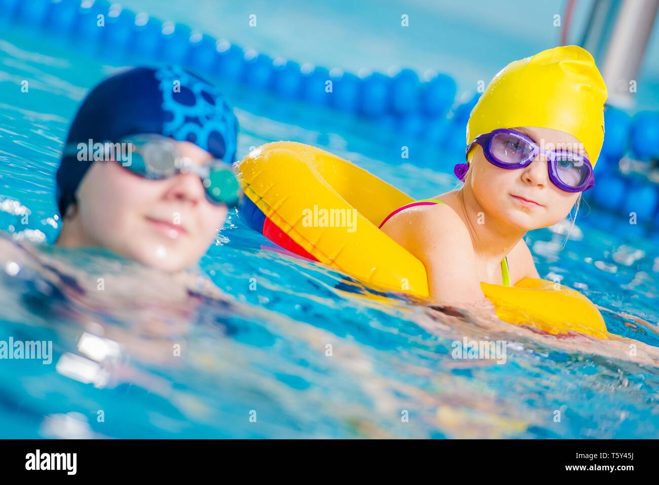 Kids in a Swimming Pool. Indoor Sport and Recreation For Children Stock ...