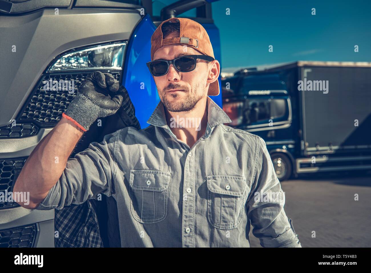 Truck Driver Occupation. Caucasian Trucker in His 30s on the Rest Area ...