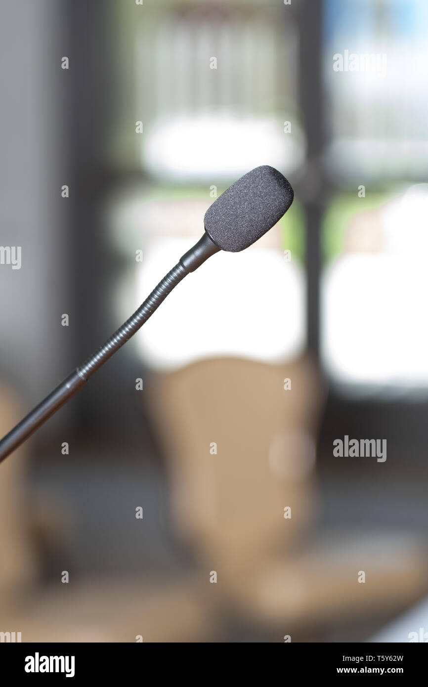 Microphone at the front of a conference room Stock Photo - Alamy