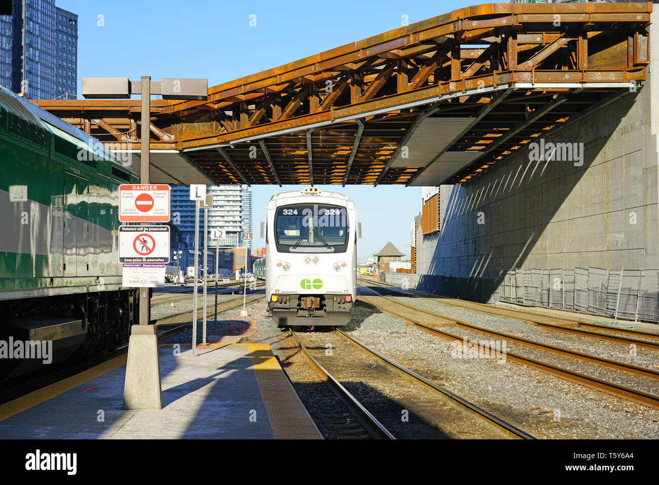 TORONTO, CANADA -26 MAR 2019- View of green and white GO transit ...