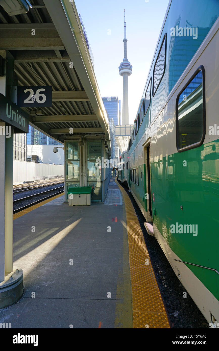 TORONTO, CANADA -26 MAR 2019- View of green and white GO transit ...