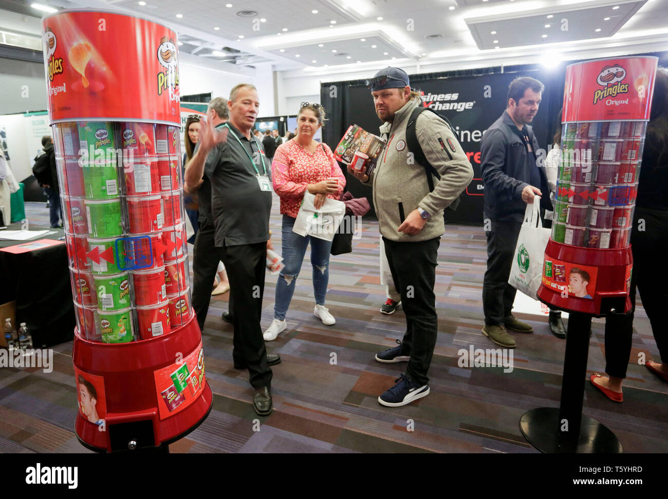 Vancouver, Canada. 27th Apr, 2019. An exhibitor displays potato chip ...