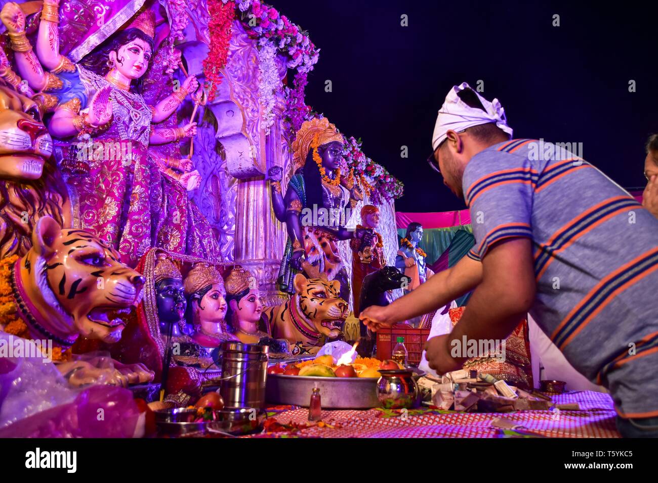 A devotee seen performing rituals. Jagran is a Hindu ritual, consisting ...